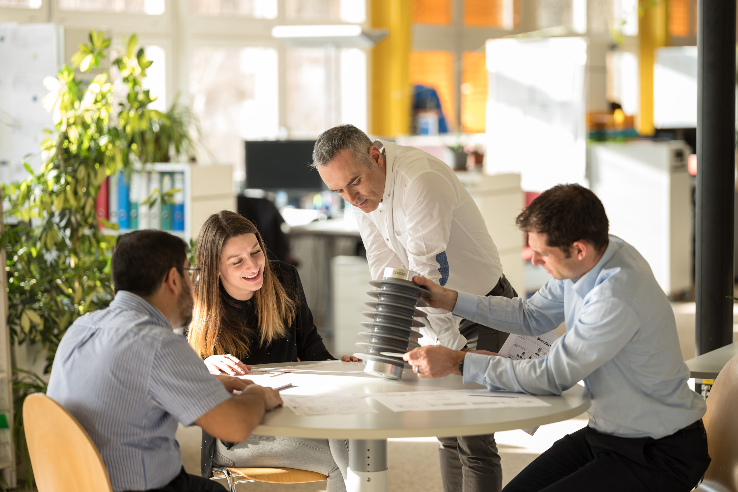 CONDIS Engineering team talking about capacitor development